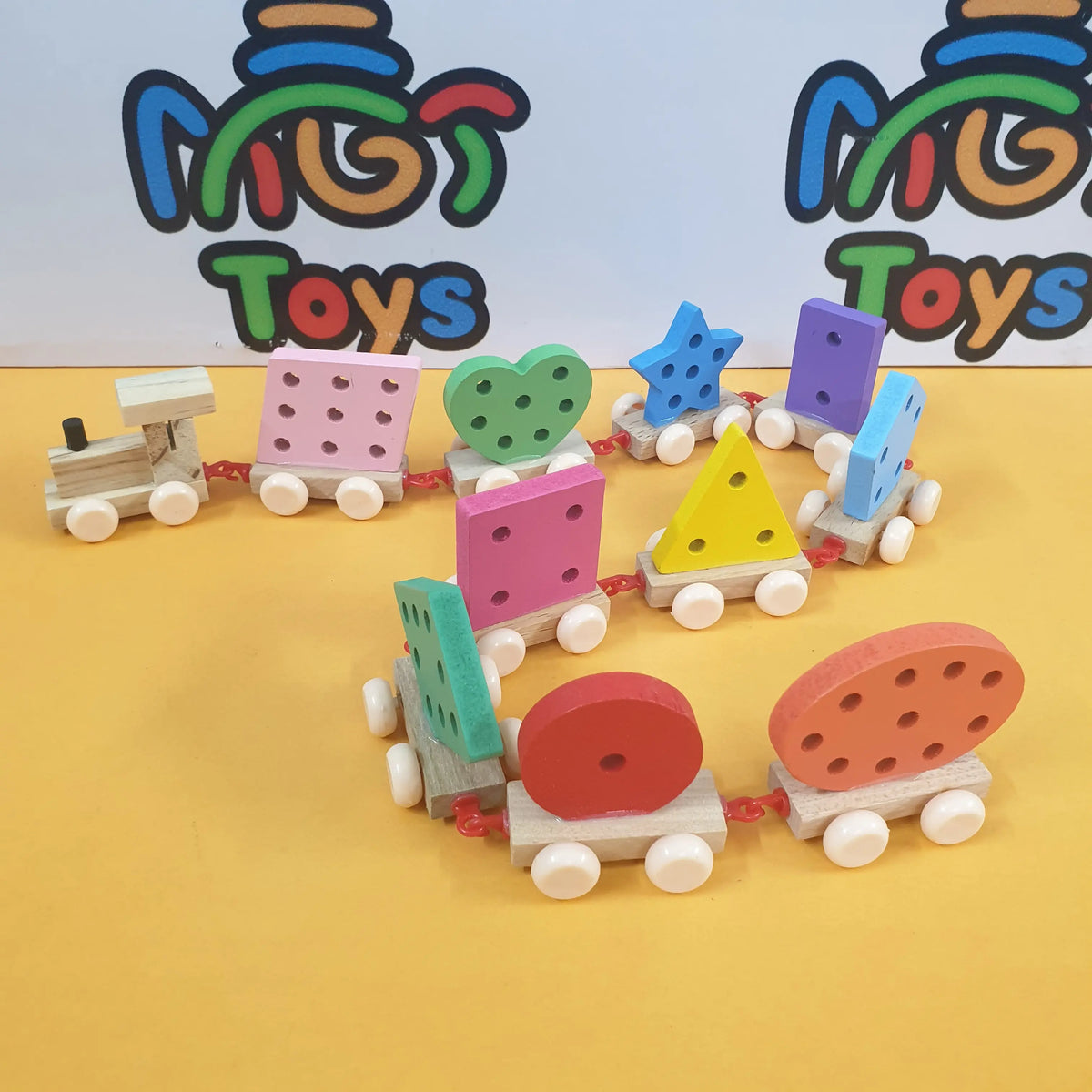 Wooden Multicolor Geometric Shapes Connecting train – MGT Toys