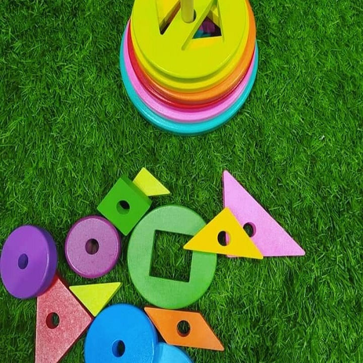 Wooden Rainbow Hidden Circular Stacking Ring Tower – MGT Toys